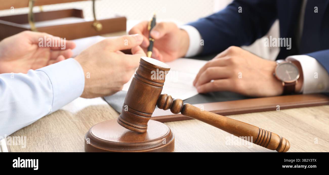 Judge working with lawyer at table indoors, focus on gavel. Banner ...