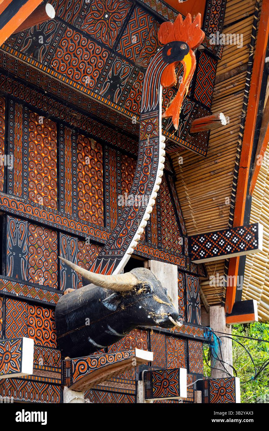 Wooden buffalo head & Katik roosteron Toraja House. The panel displays ...