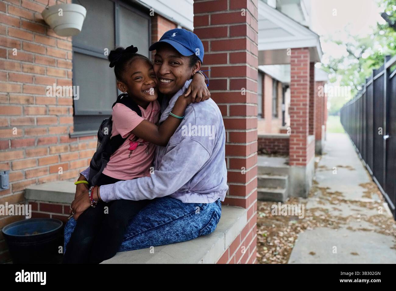Millicent Brown, right, and her daughter, Nova Brown, 5, pose for a ...
