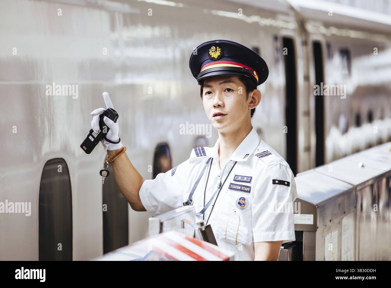 KYOTO, JAPAN - SEPTEMBER 24, 2024: Kyoto train station staff during ...