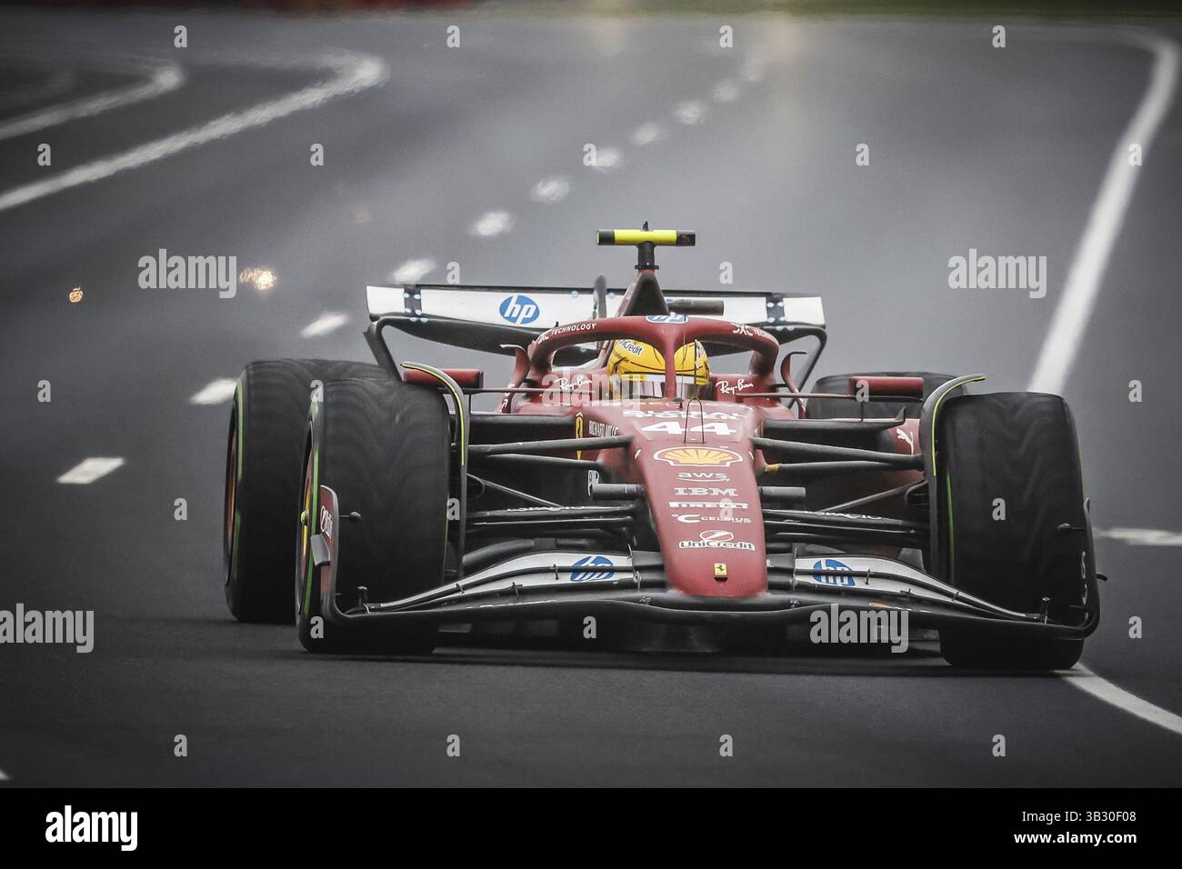 Lewis Hamilton of Great Britain drives the Scuderia Ferrari HP during ...