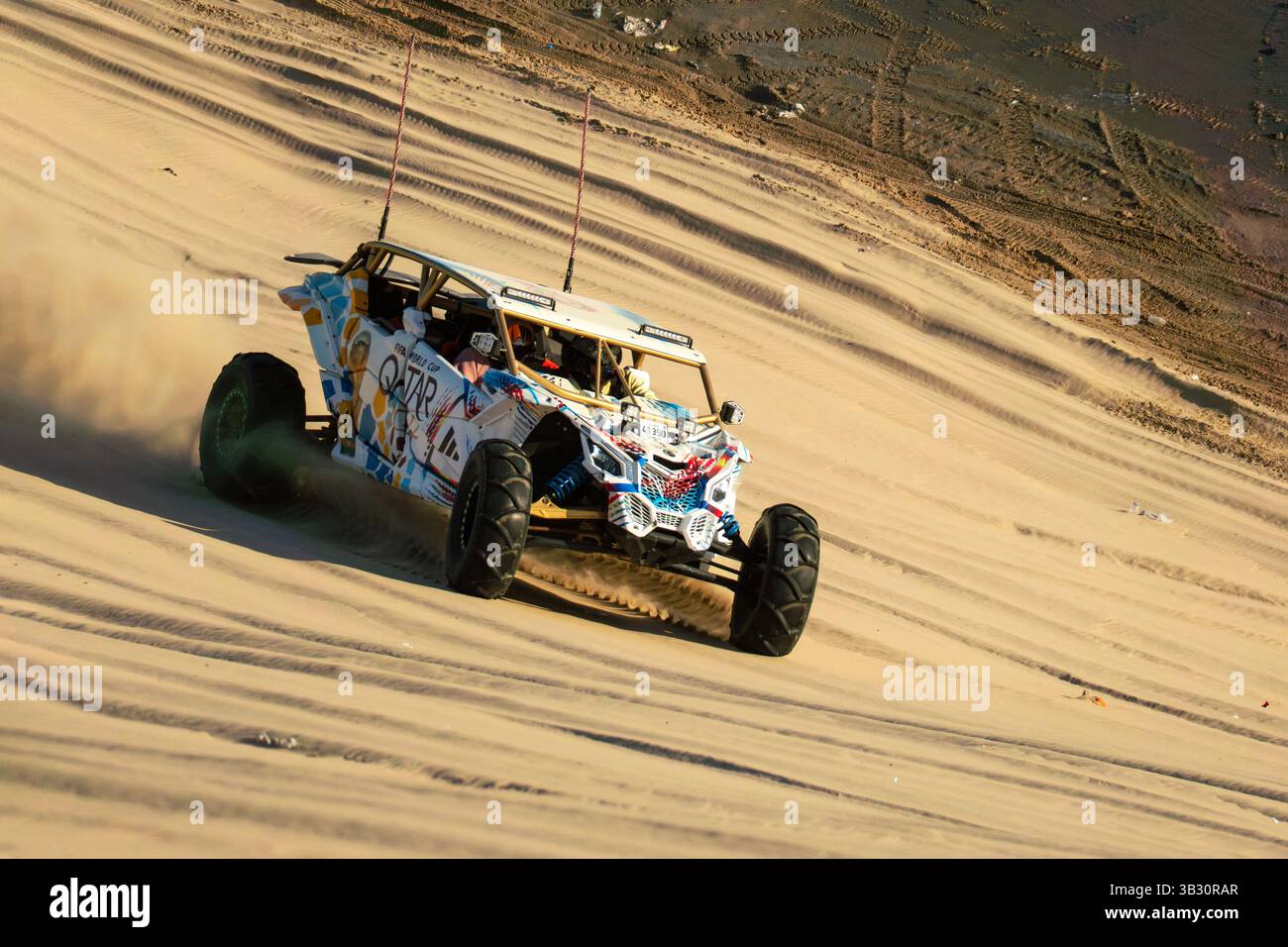 Doha, Qatar, January 31th 2025: Off road buggy car in the sand dunes of ...