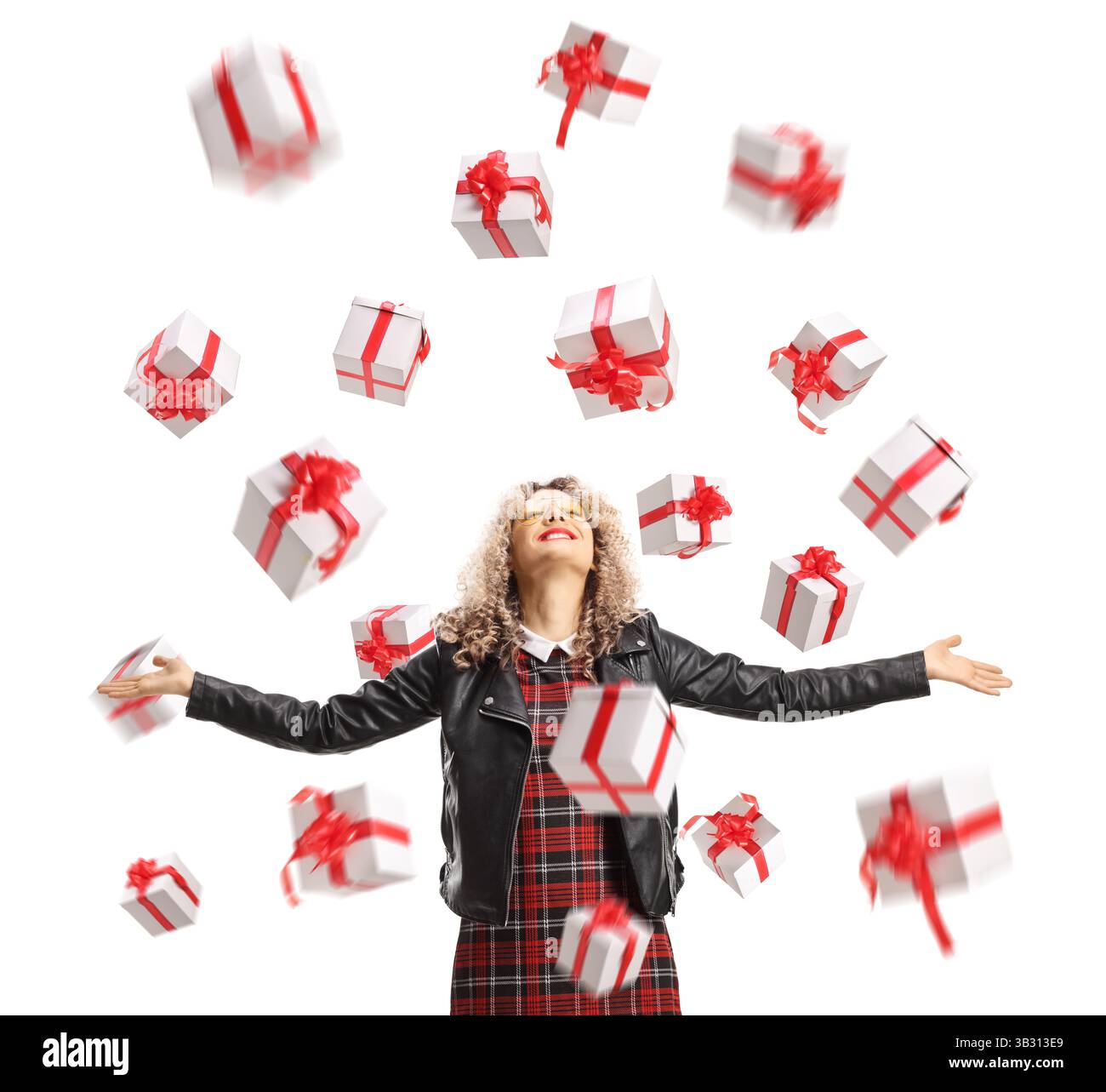 Happy woman standing under falling presents isolated on white ...