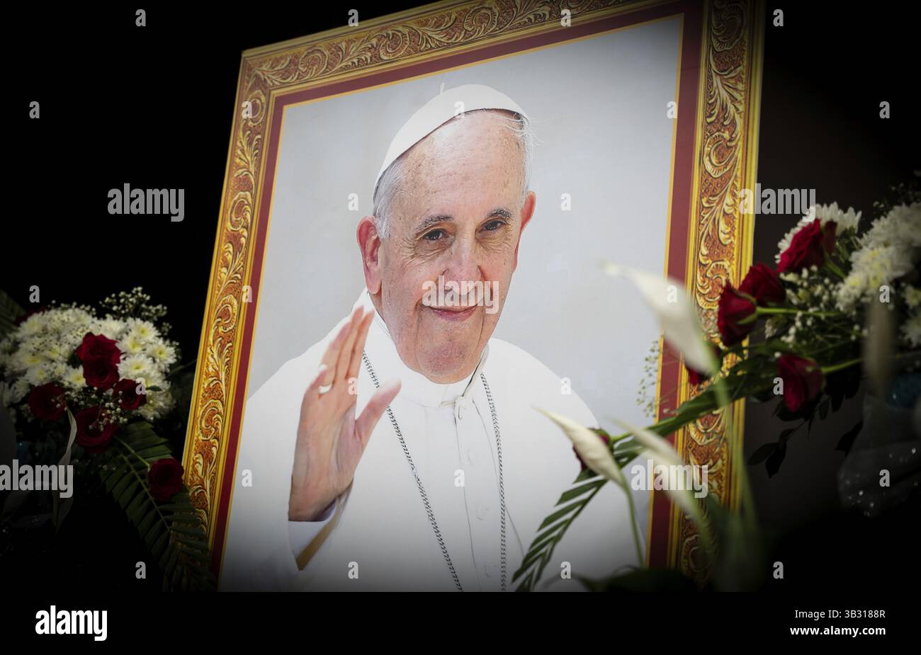 Framed photo of Pope Francis stands during the ceremonial tribute in ...
