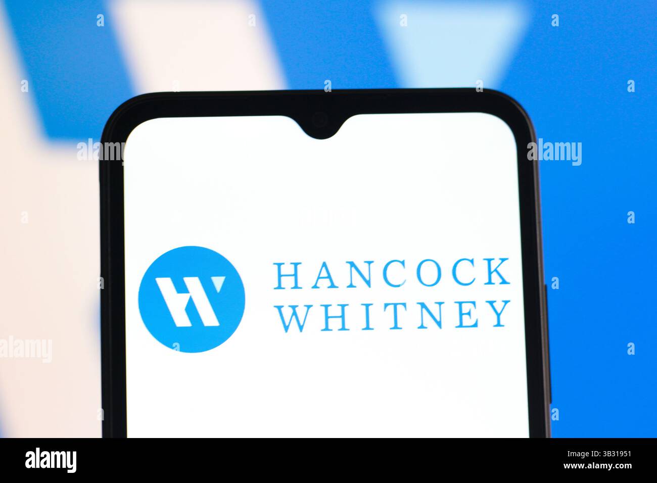 In this photo illustration, the Hancock Whitney Corporation logo is ...