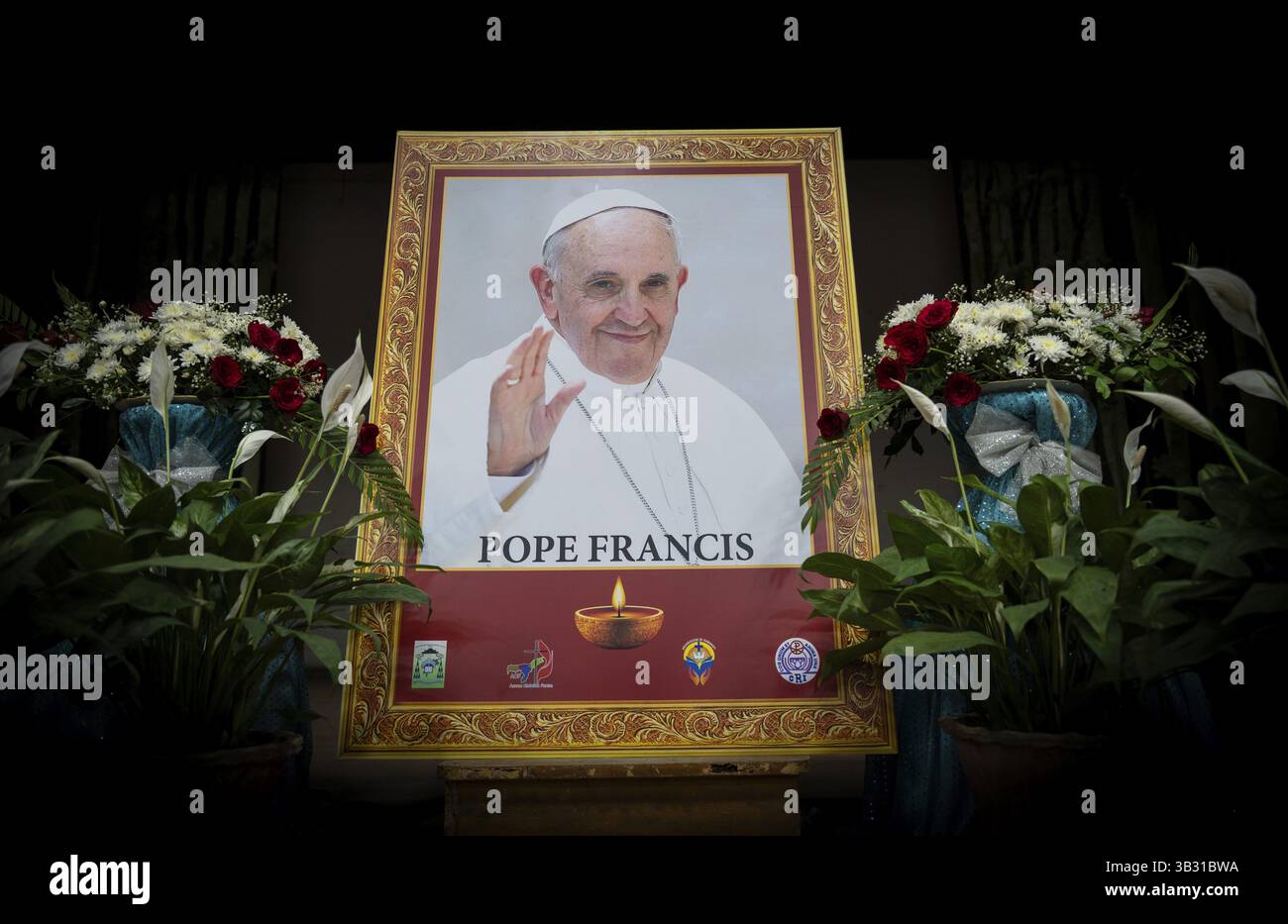 Framed photo of Pope Francis stands during the ceremonial tribute in ...