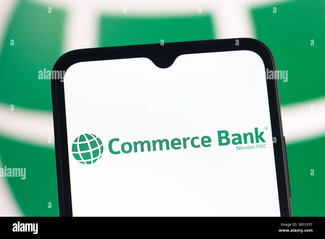 In this photo illustration, the Commerce Bank logo is seen displayed on ...
