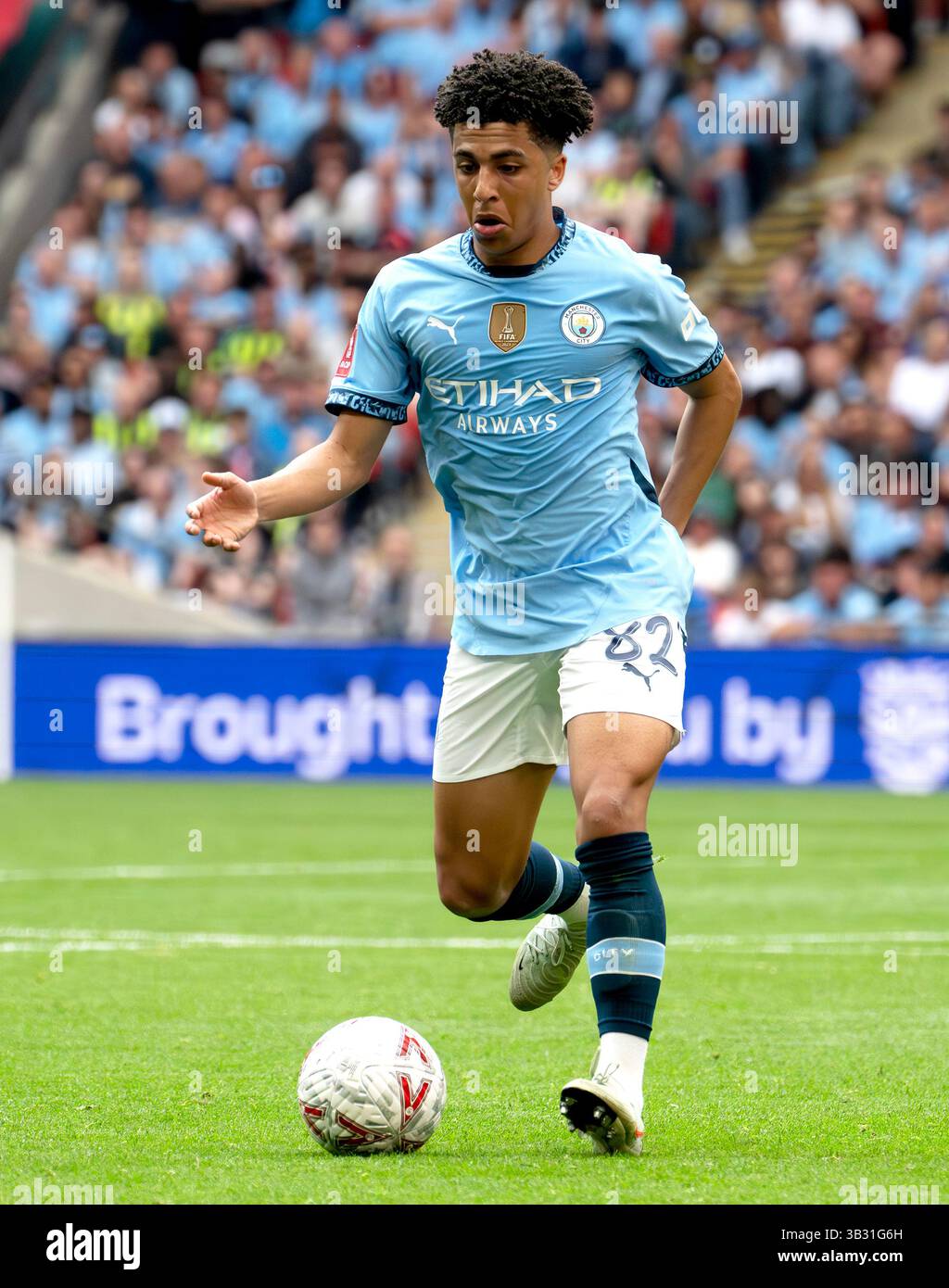 Rico Lewis of Manchester City in action. The Emirates FA Cup semi final ...
