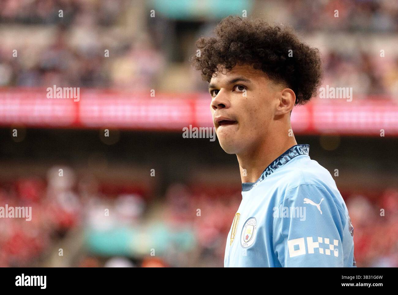 London, UK. 27th Apr, 2025. Nico O'Reilly of Manchester City looks on ...