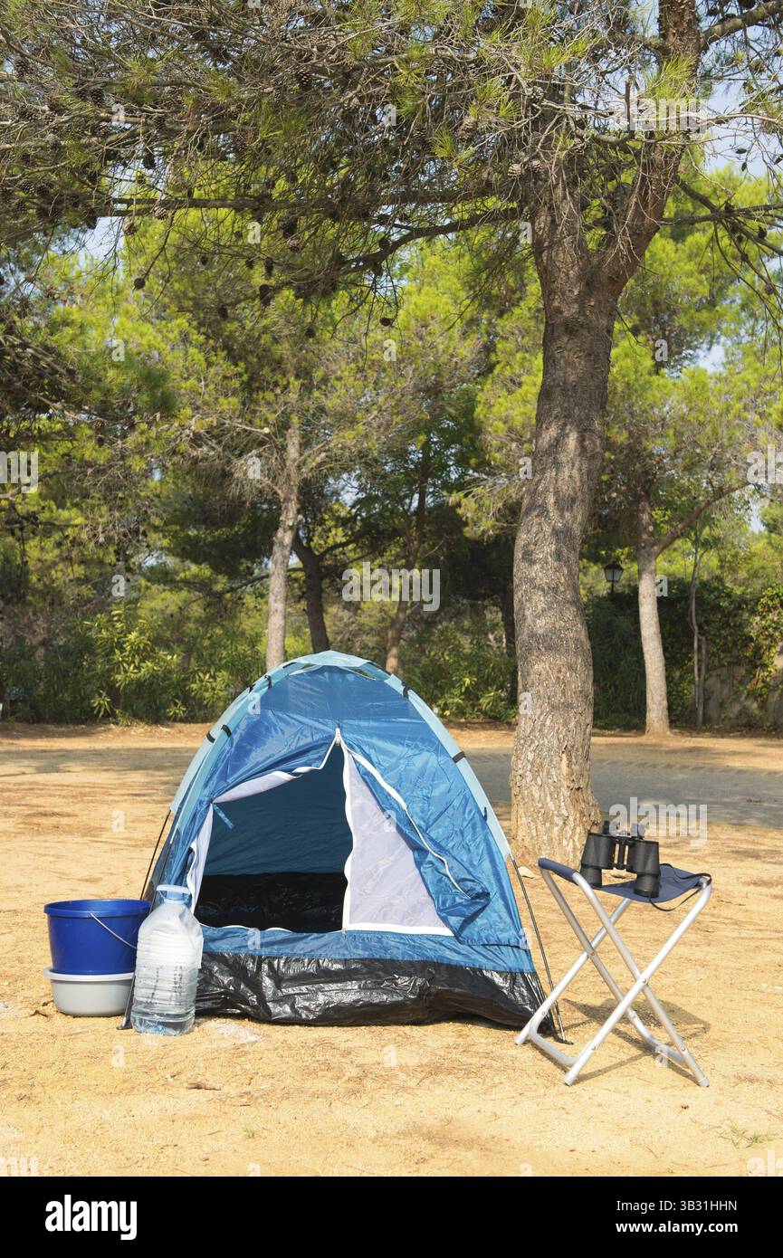 Blue dome tent for adventure camping Stock Photo - Alamy