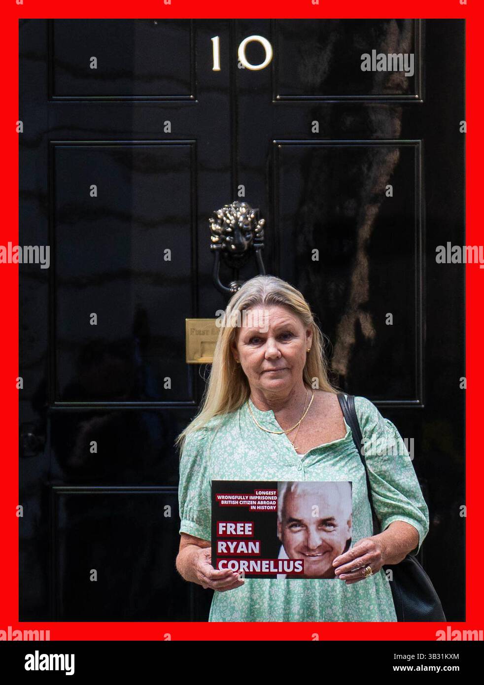 PABest Heather Cornelius poses as she hands a letter to 10 Downing ...