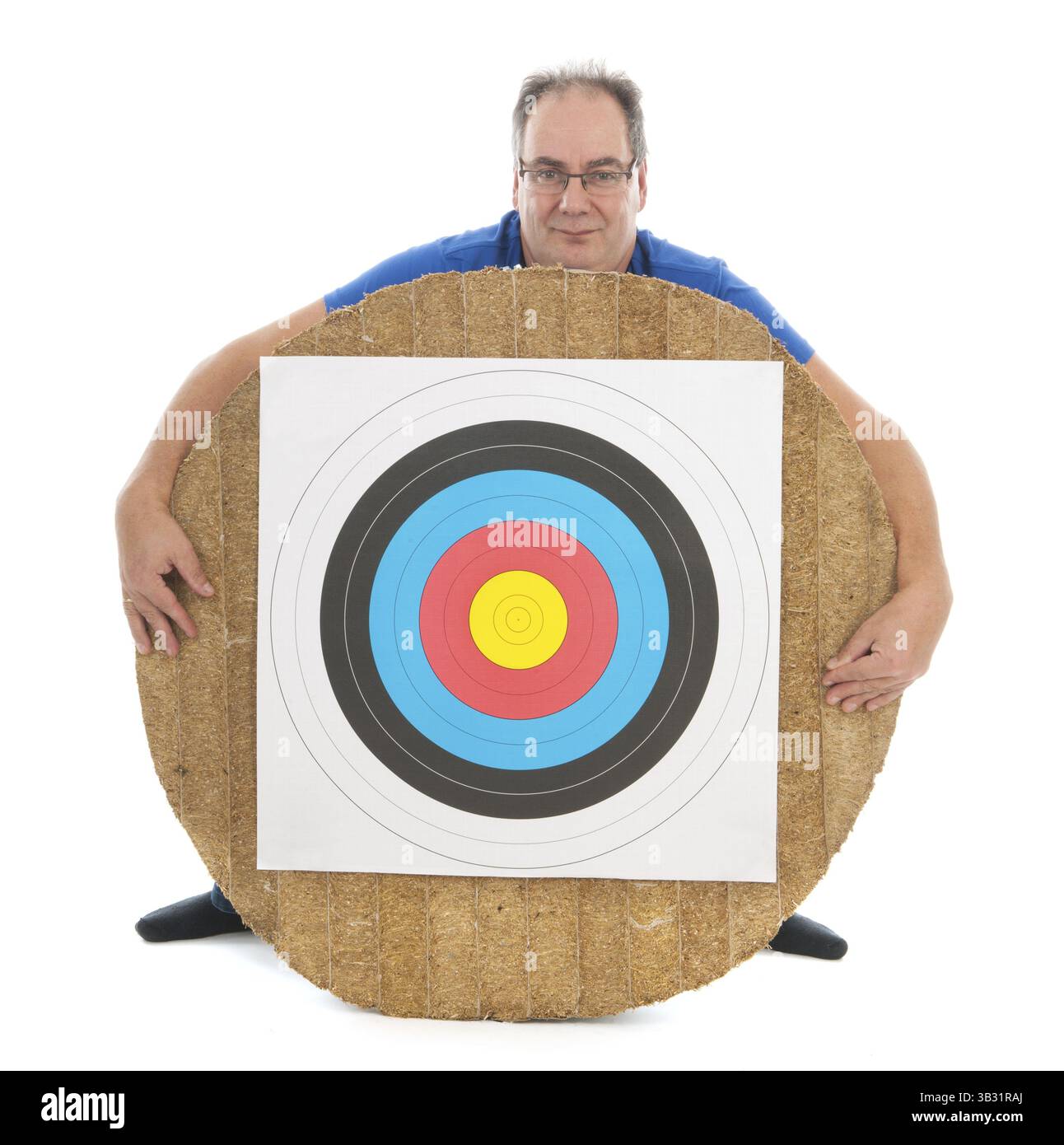 Adult man behind archery target isolated over white background Stock ...