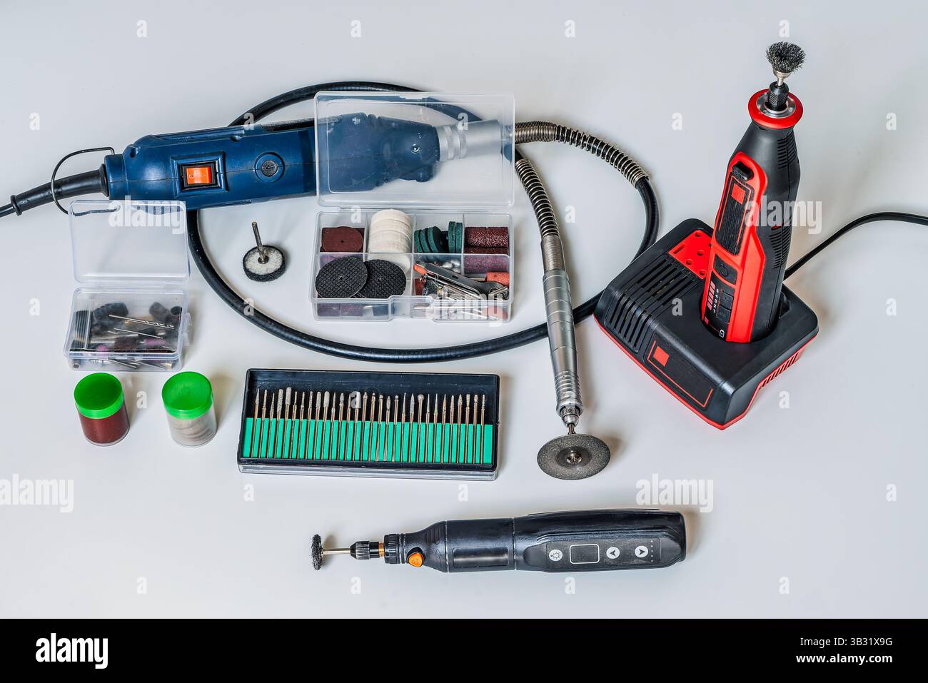 Composition on a white background featuring various handheld rotary ...