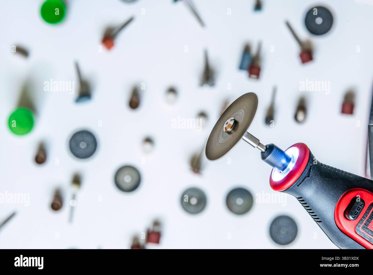 Close-up of a rotary engraving tool head fitted with a cutting disc ...