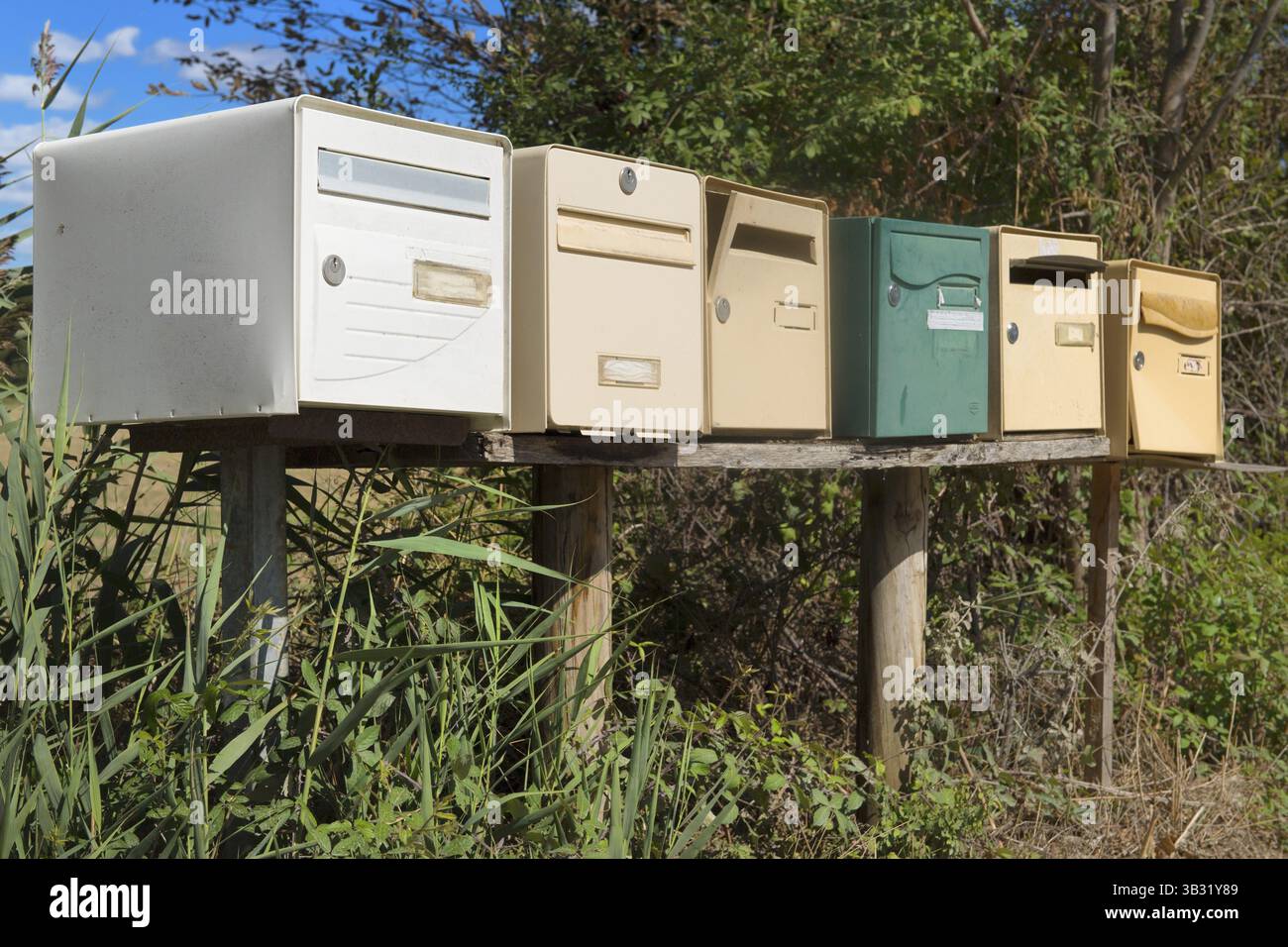 Row of postal boxes hi-res stock photography and images - Alamy