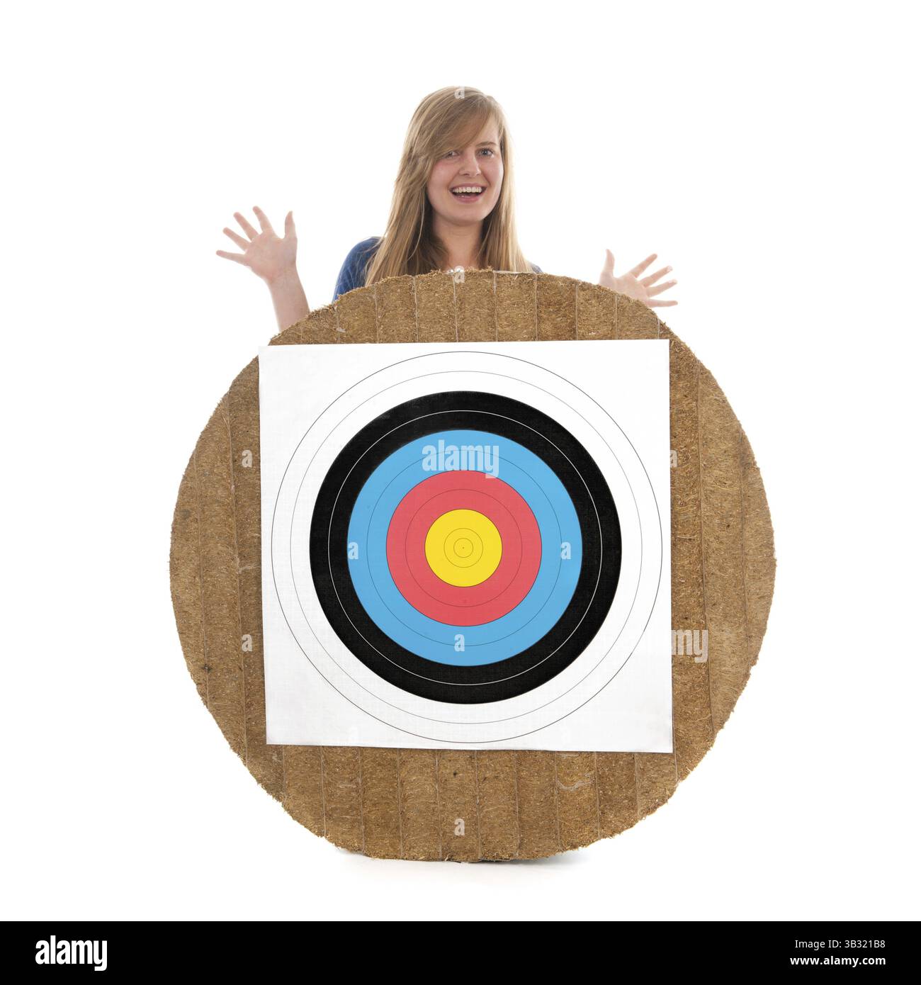 Teen girl behind archery target isolated over white background Stock ...