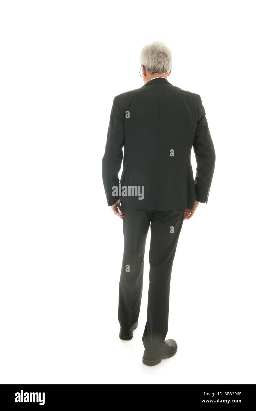 Business man walking away Cut Out Stock Images & Pictures - Alamy