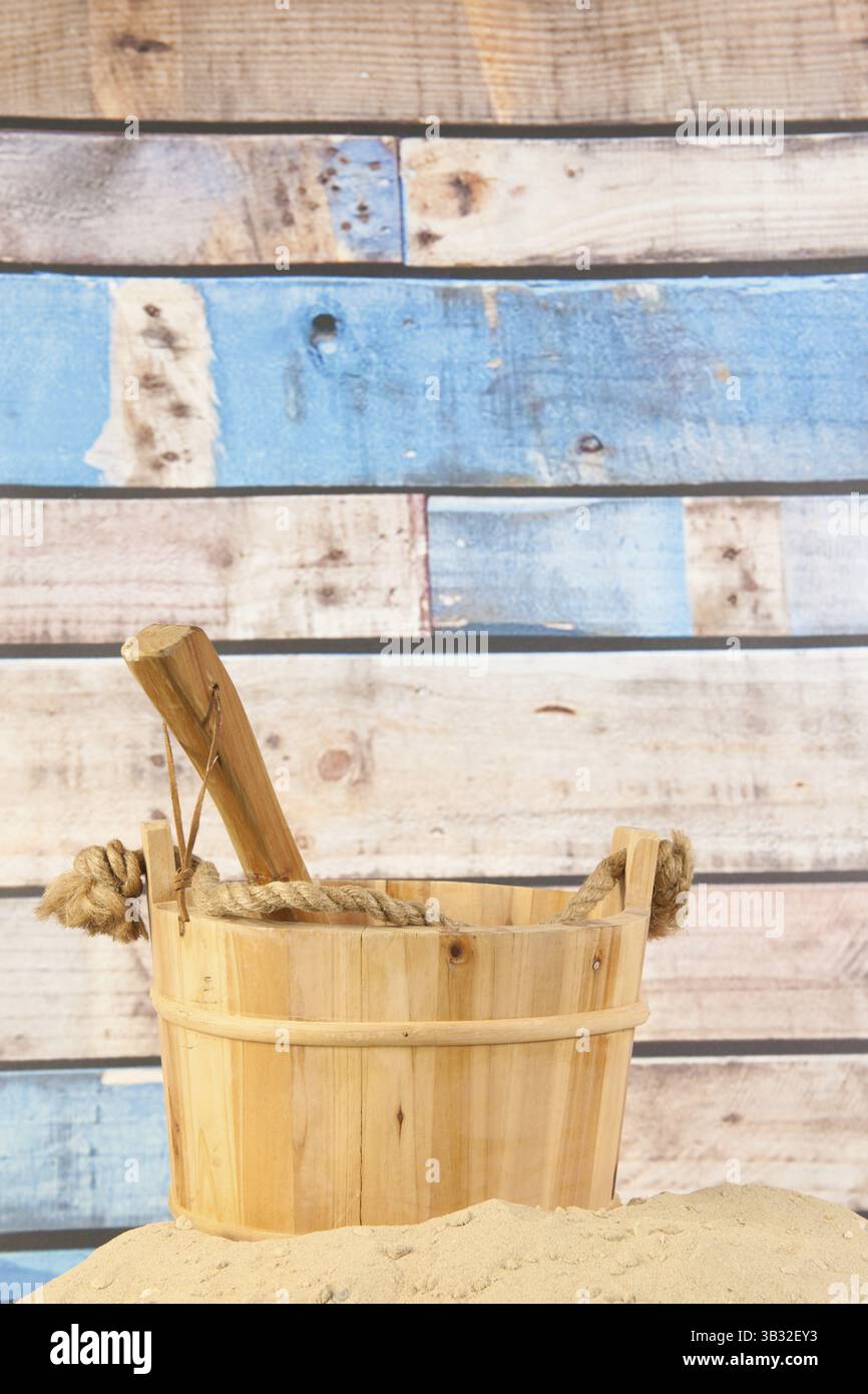 Wooden sauna bucket and spoon in interior Stock Photo - Alamy
