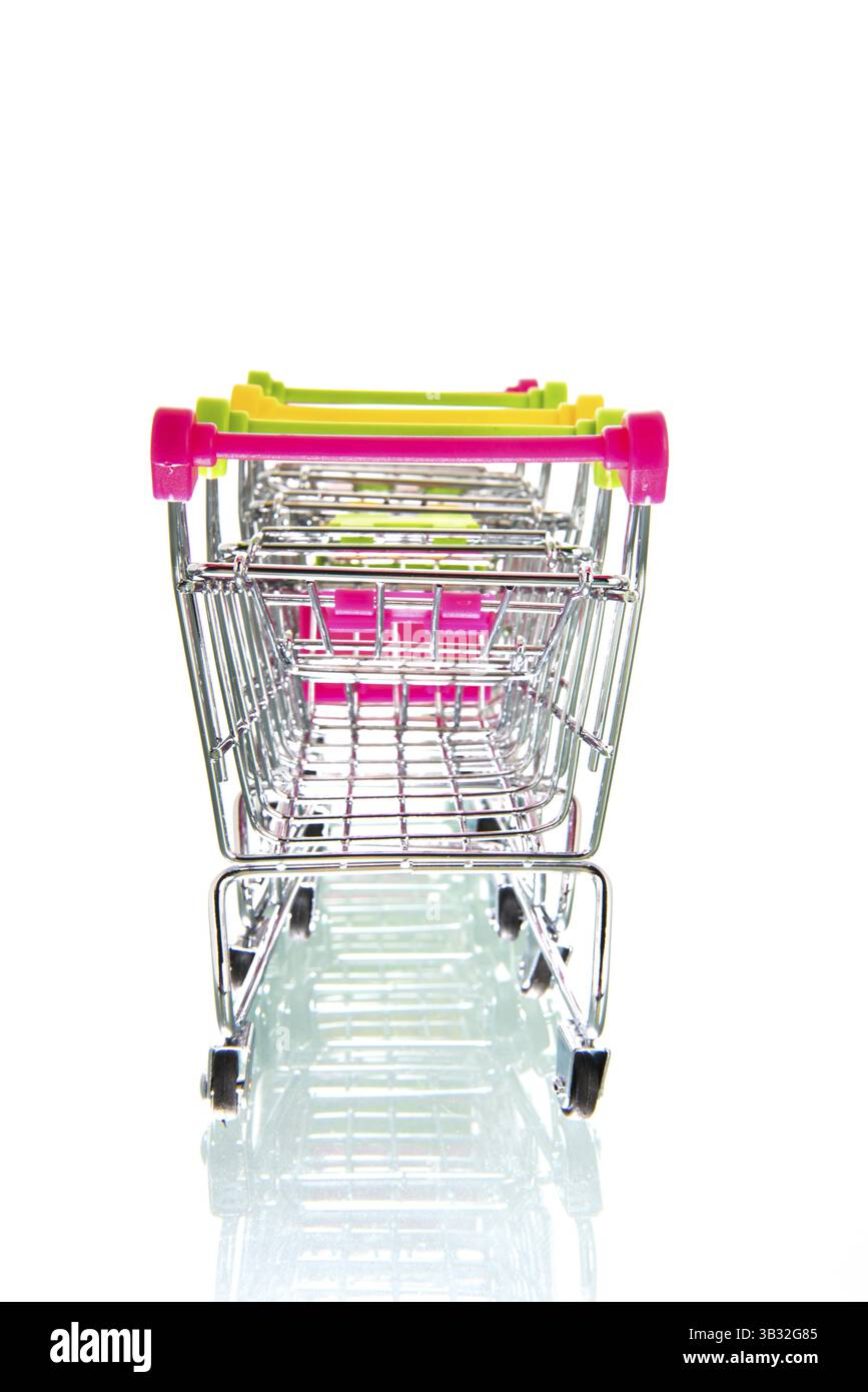 Row empty shopping carts isolated white background Stock Photo - Alamy