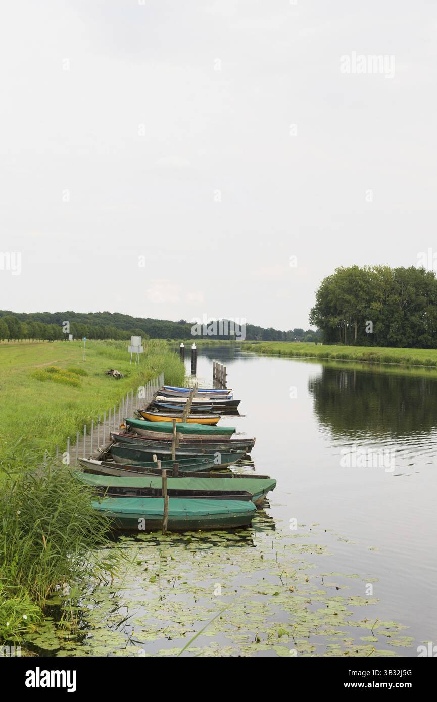Rowboat in middle of river hi-res stock photography and images - Alamy