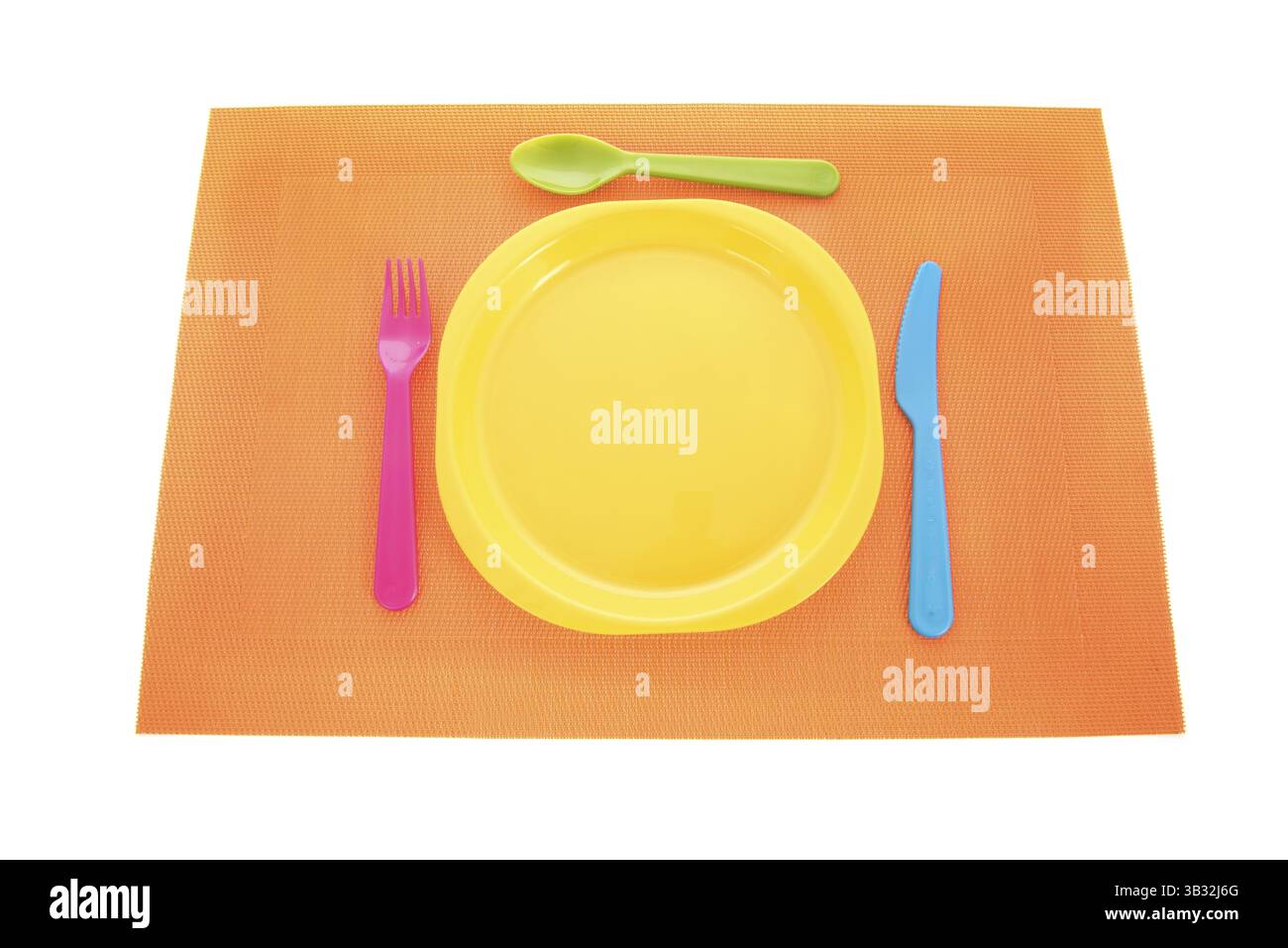 Set table with place mat, plate and cutlery Stock Photo - Alamy