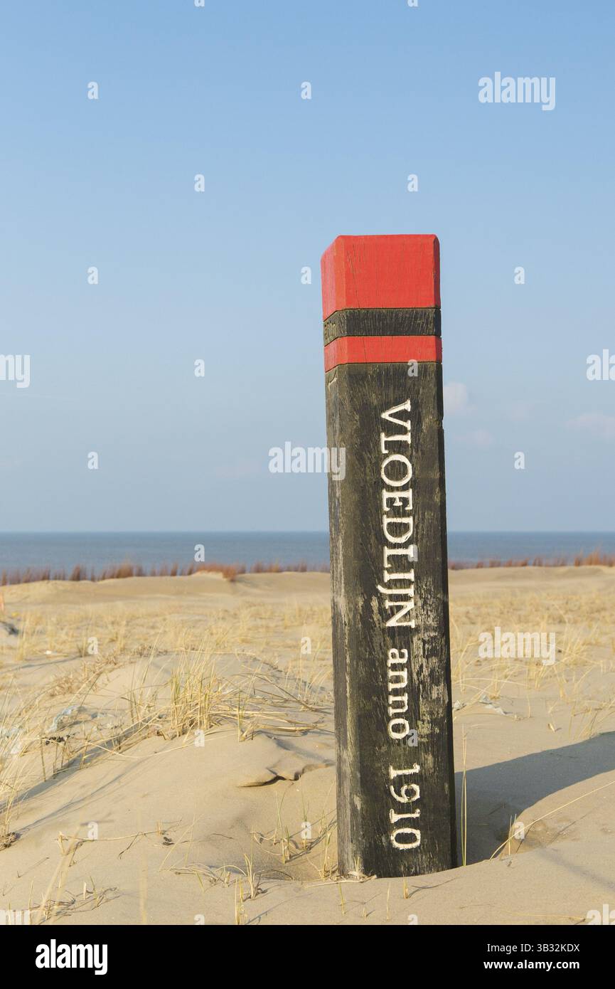 High tide pole on Dutch wadden island Texel Stock Photo - Alamy