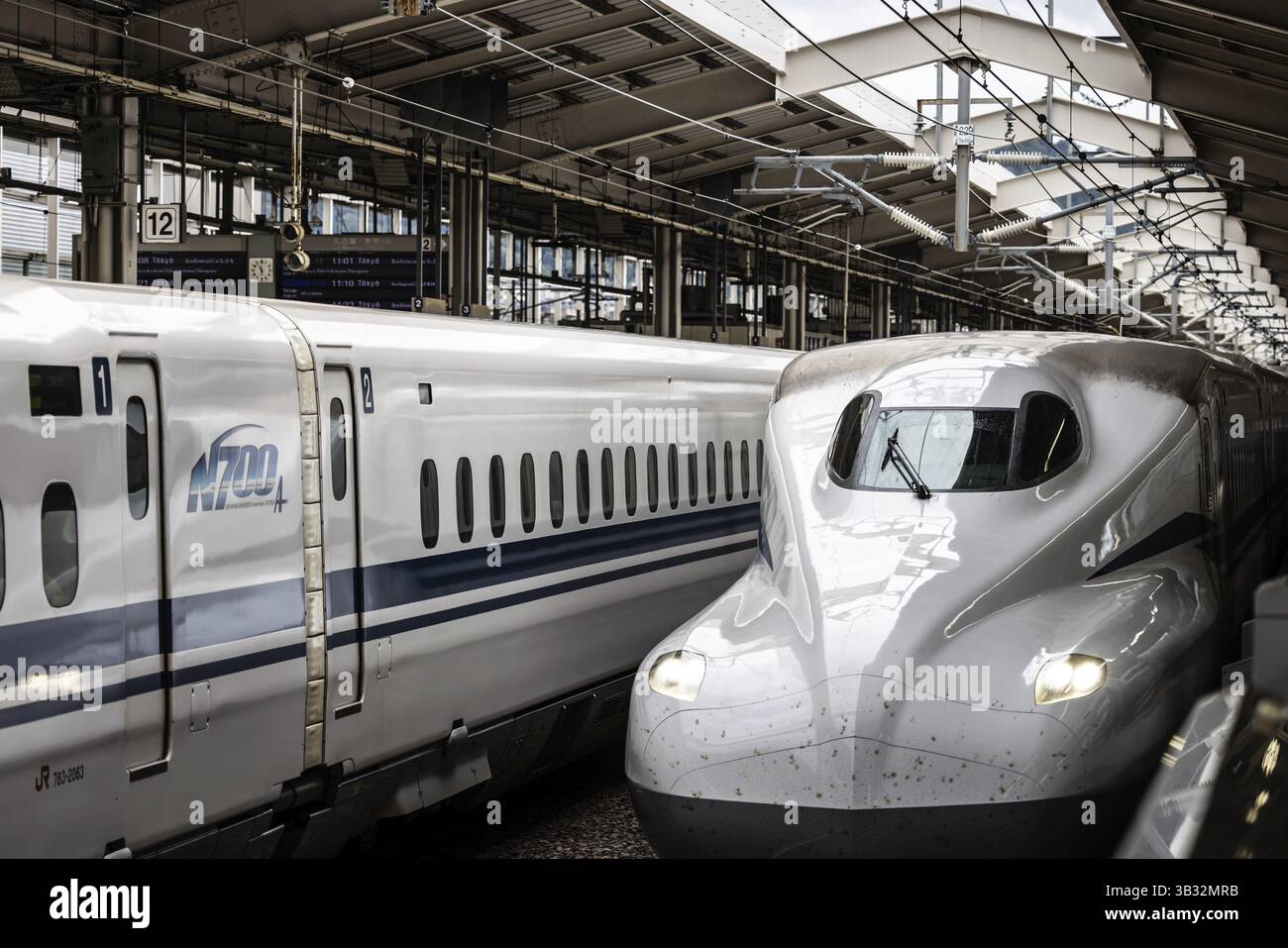 KYOTO, JAPAN - SEPTEMBER 24 2024: A Shinkansen high-speed bullet train arriving at Kyoto Station ...