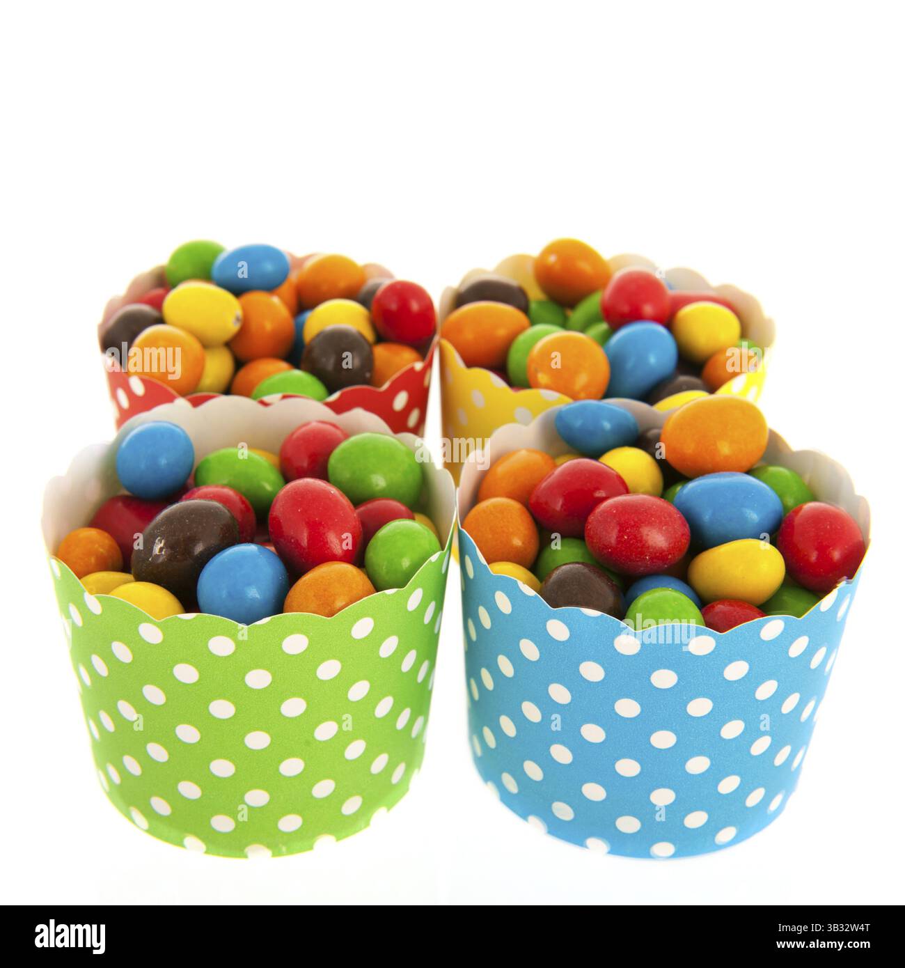 Colorful party candy in cups isolated over white background Stock Photo ...