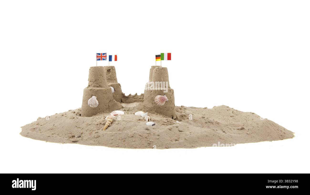 Sand castle with little flags from Europe at the beach Stock Photo - Alamy