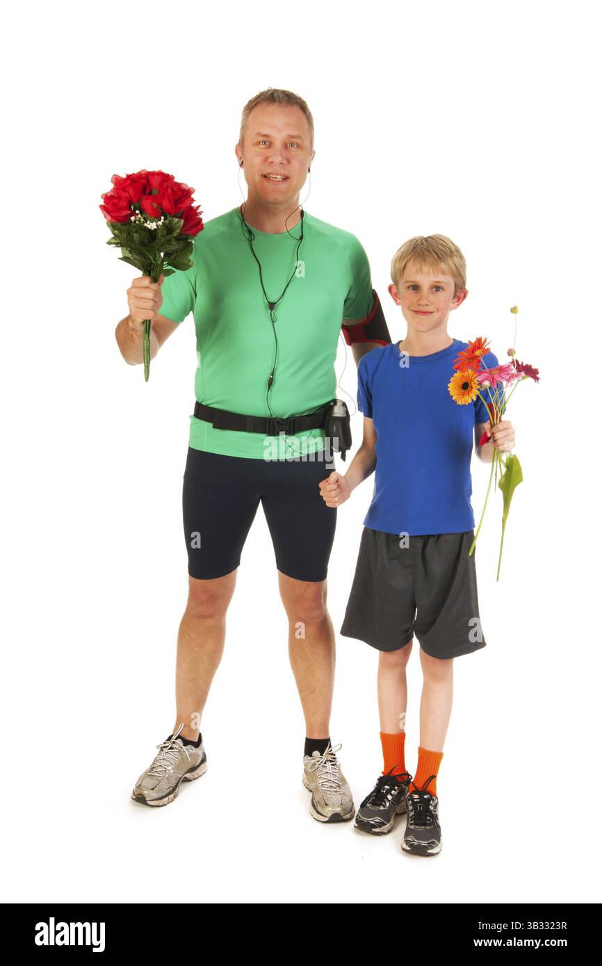Winning father and son with flowers Stock Photo - Alamy