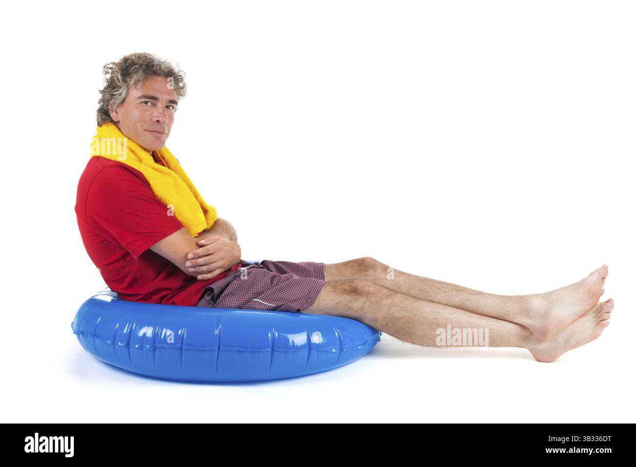 Adult man is sitting on a float Stock Photo - Alamy