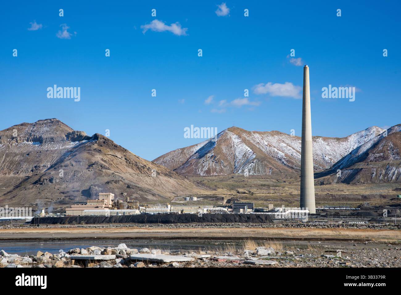 Tall smokestack rises in hi-res stock photography and images - Alamy