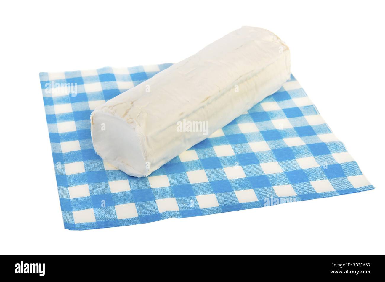 Roll goat cheese on checked blue napkin Stock Photo - Alamy