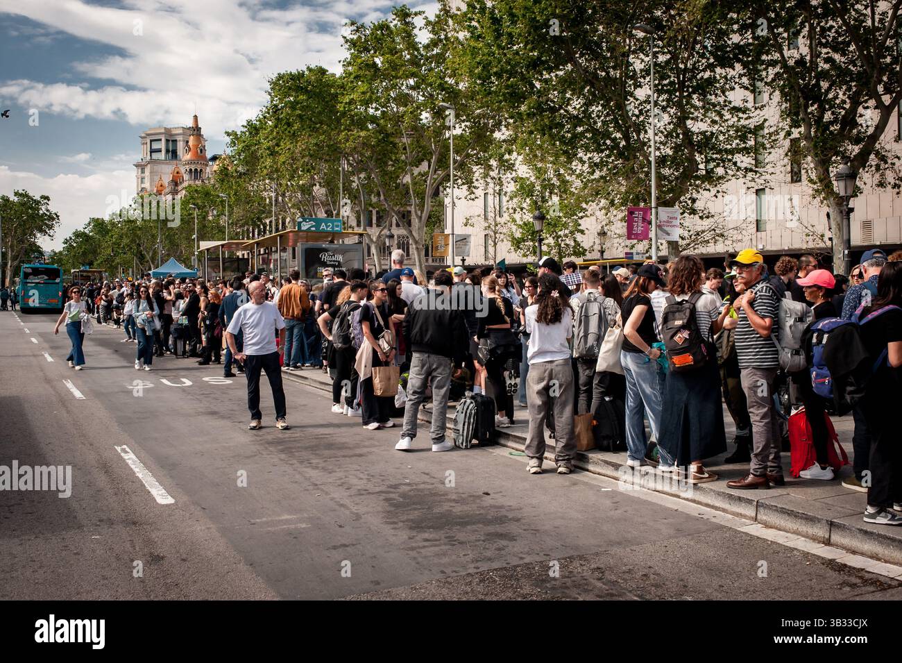 Barcelona, Spain. April 28, 2025, Barcelona, Spain: People queue and ...