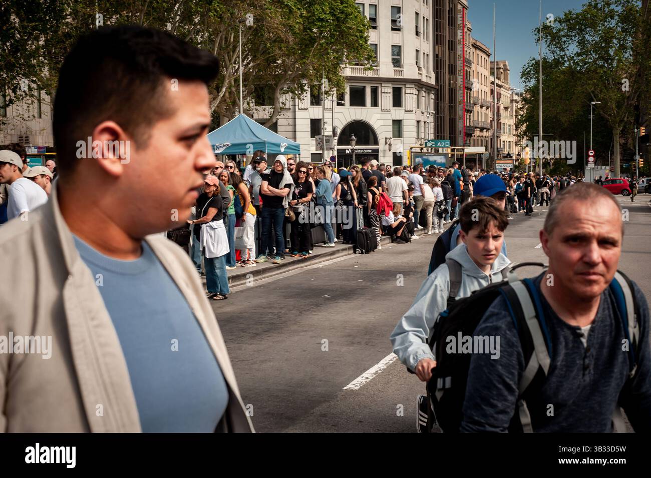 Barcelona, Spain. April 28, 2025, Barcelona, Spain: People queue and ...
