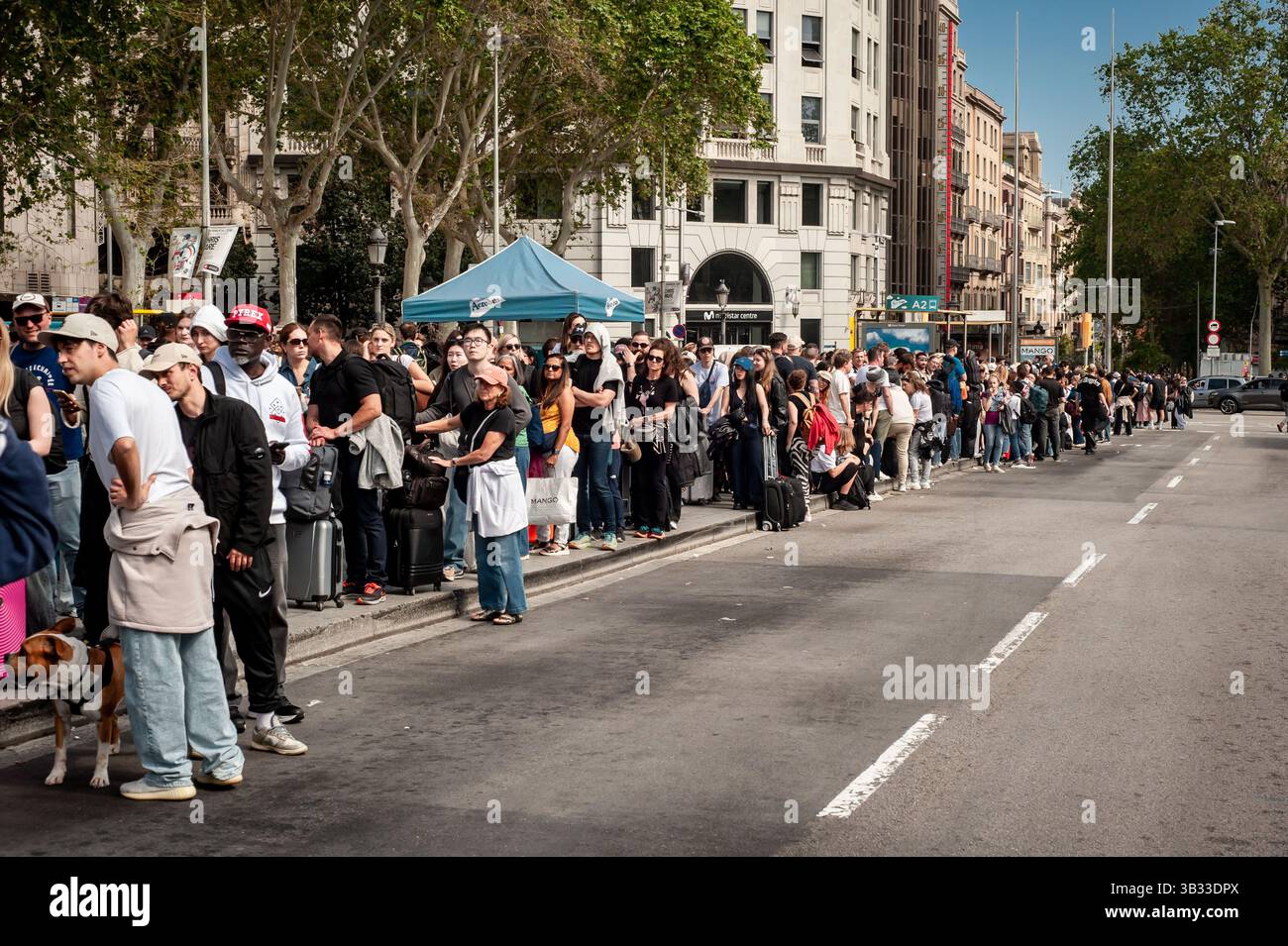 Barcelona, Spain. April 28, 2025, Barcelona, Spain: People queue and ...