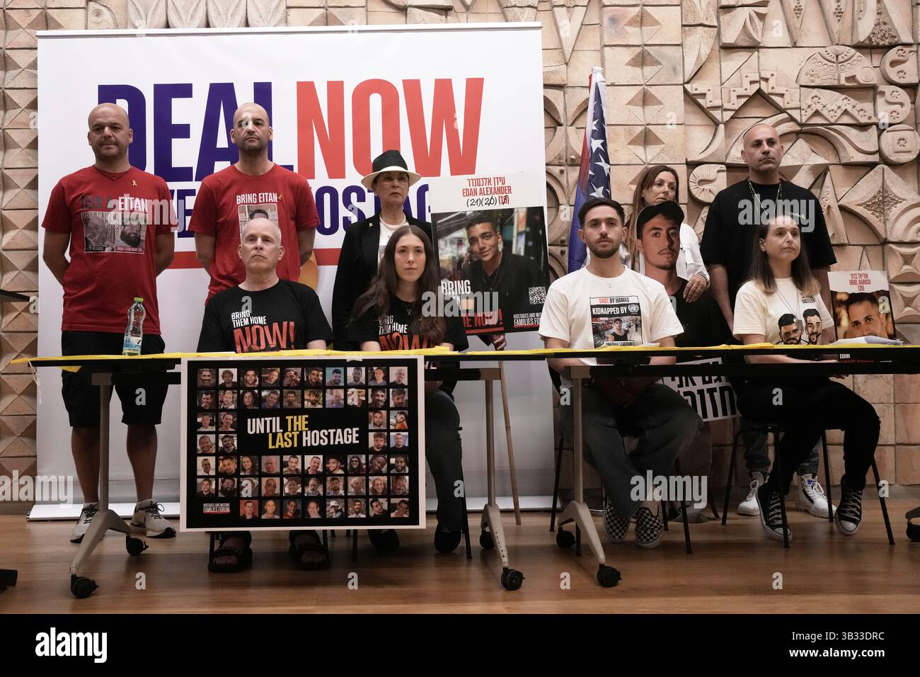 Freed Israeli hostages and family of hostages still in Gaza pose for a ...