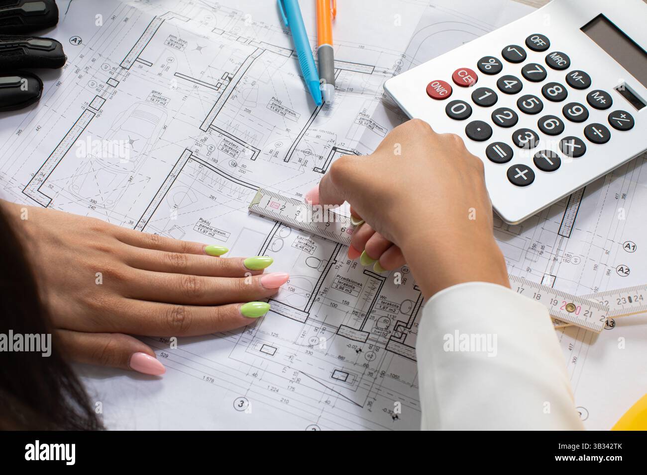 An Office Workspace that features a Calculator along with various ...