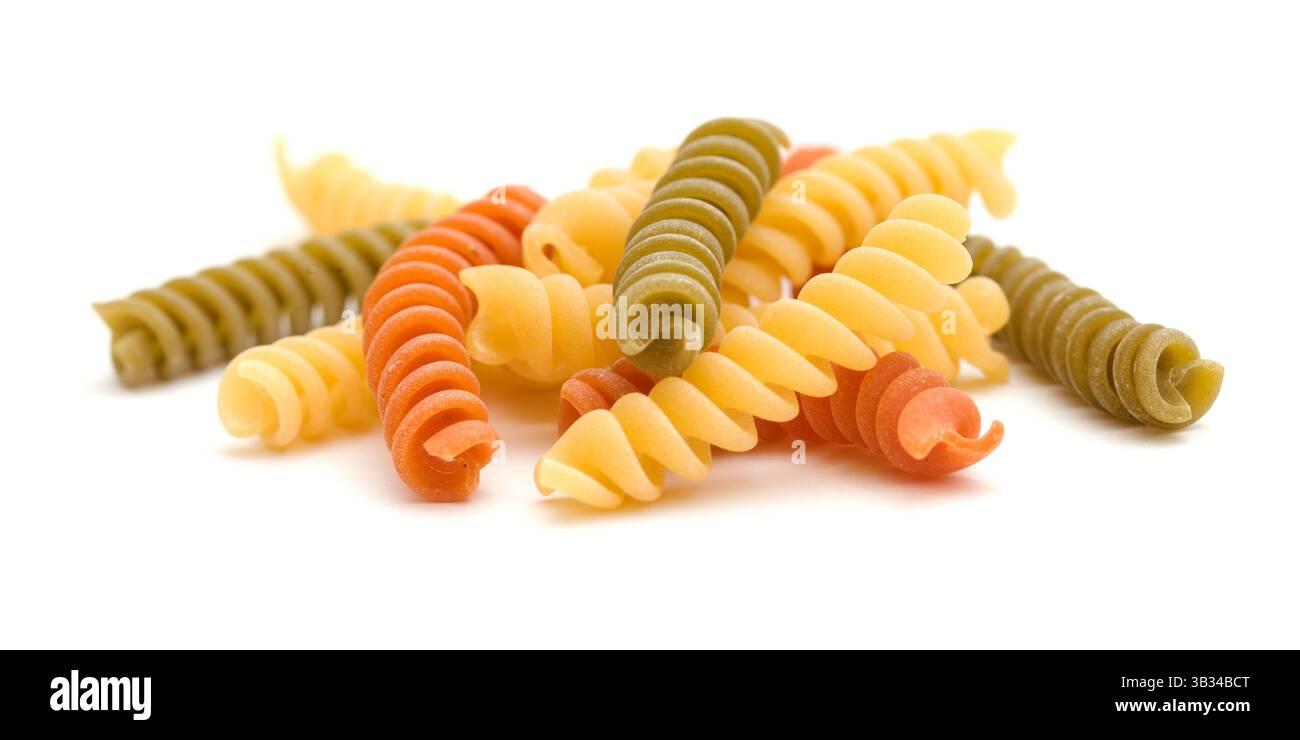 Fusilli tricolore pasta isolated on white background Stock Photo - Alamy