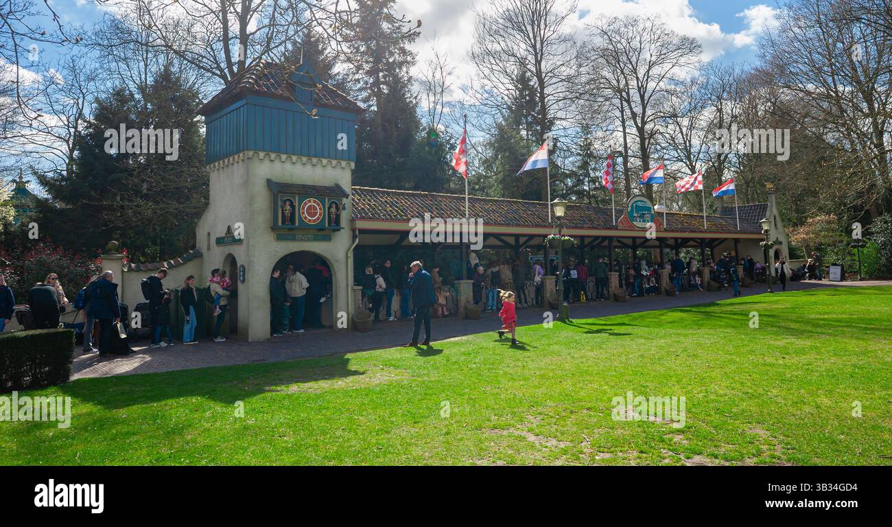 People wait at a picturesque station for the steam train at Efteling ...