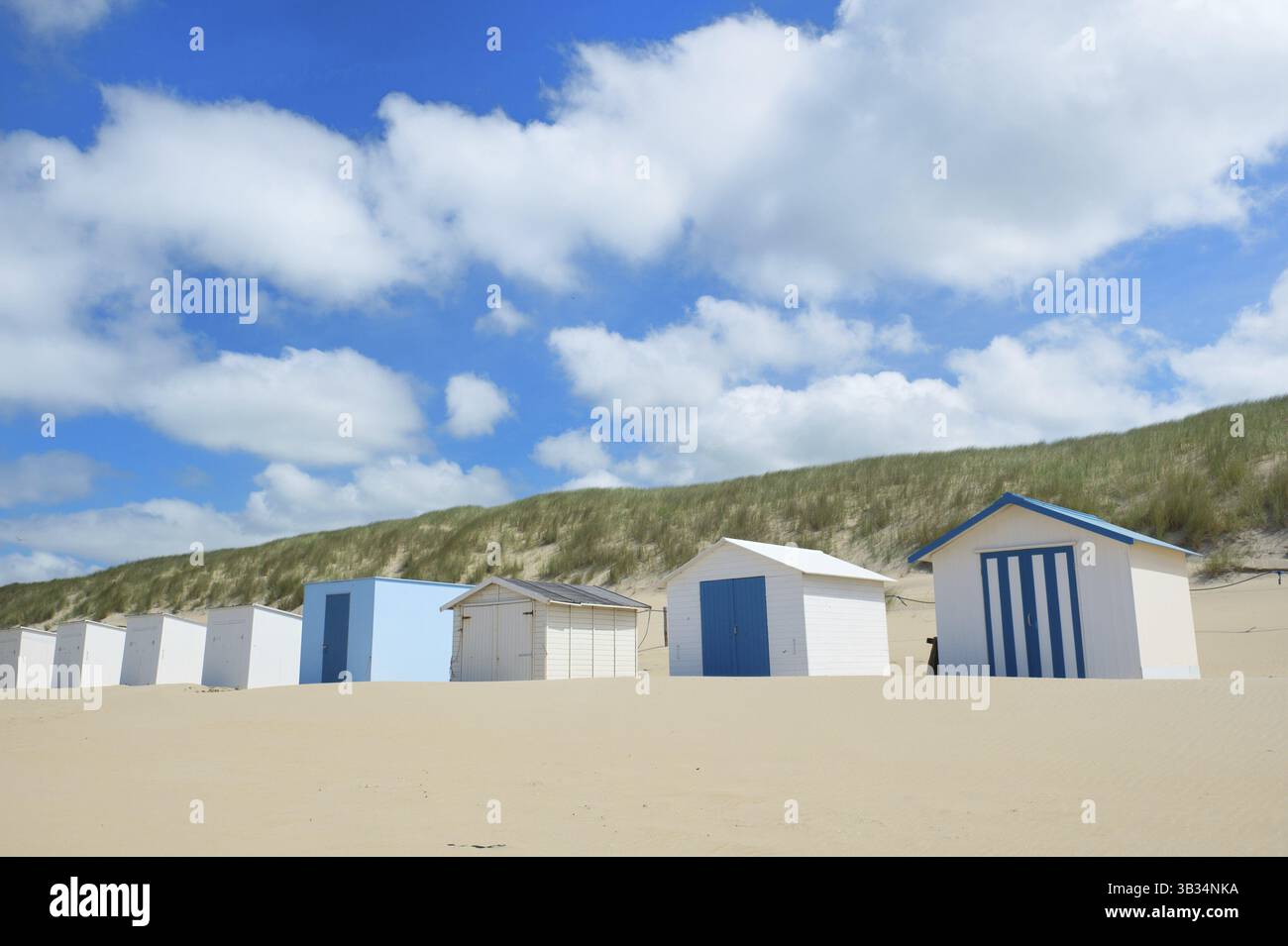 Row blue and white beach cabins for vacation surpose Stock Photo - Alamy