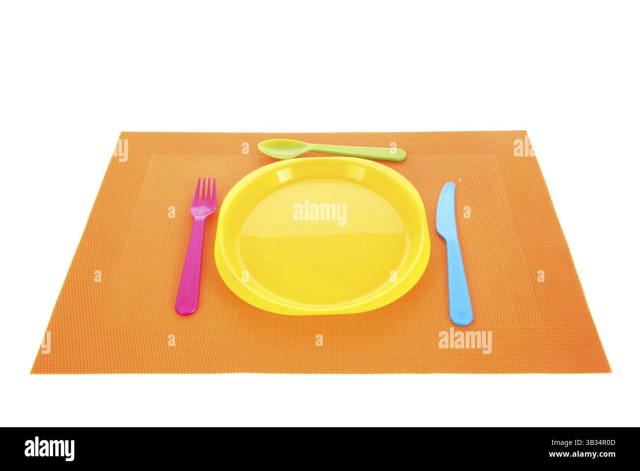 Set table with place mat, plate and cutlery Stock Photo - Alamy