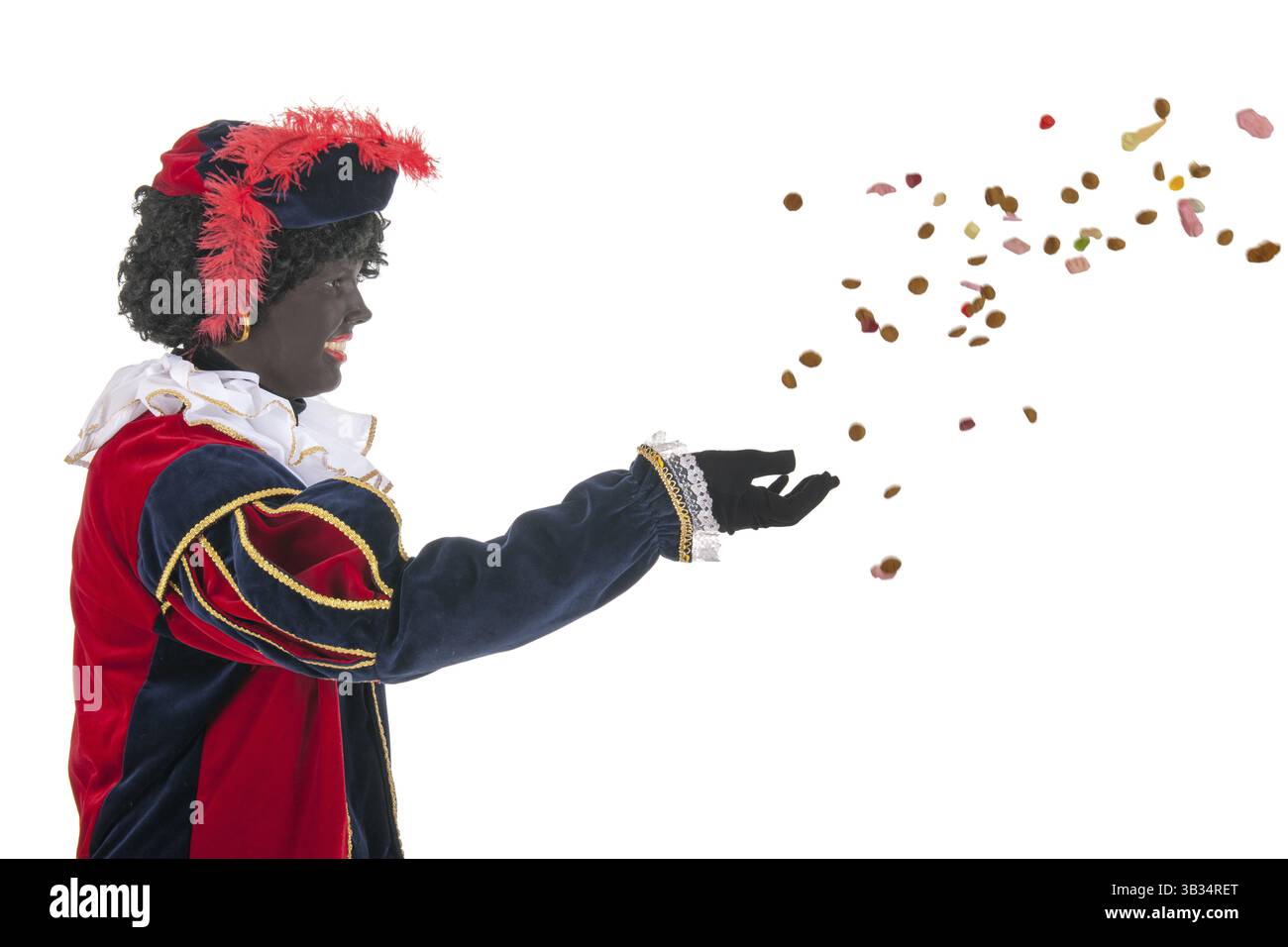 Traditional Dutch black Pete is throwing Sinterklaas candy Stock Photo ...