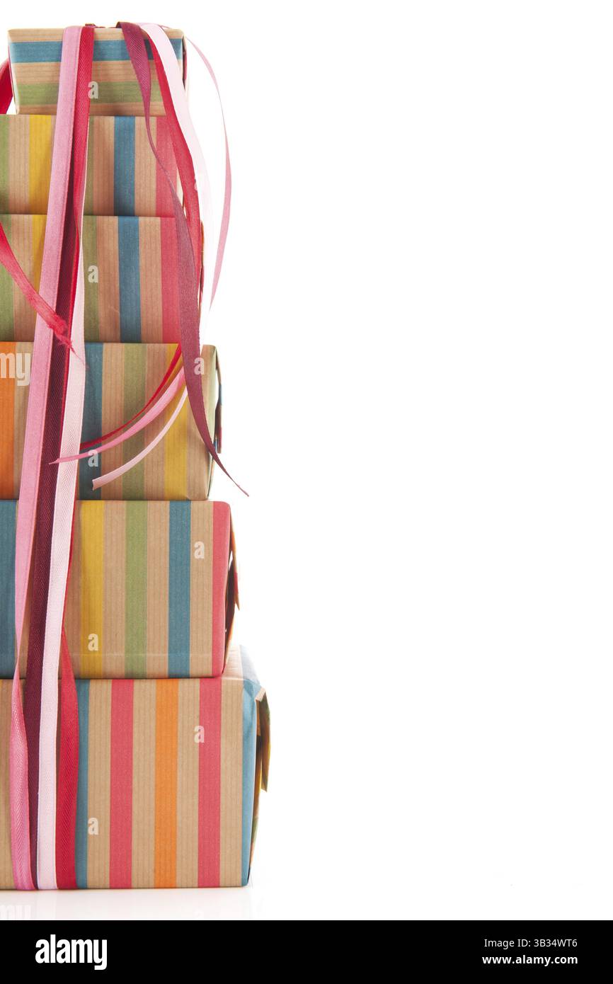 Colorful stack with wrapped presents and copy space isolated on white ...