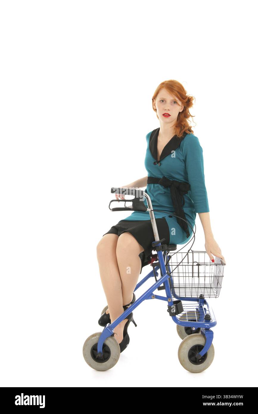 Disabled young woman with walker Stock Photo - Alamy