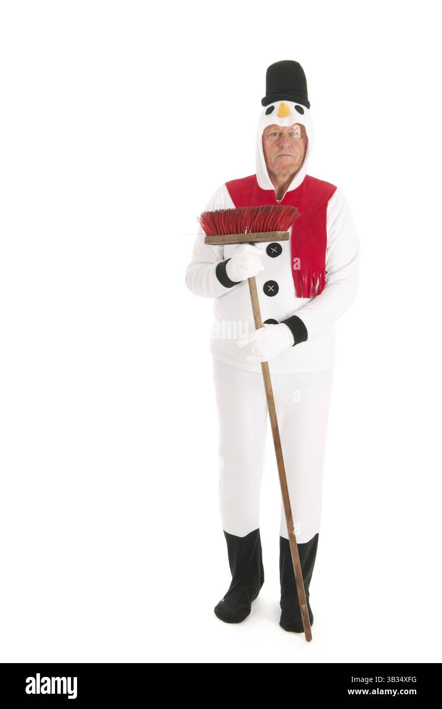 Human snowman is cleaning the street with broom Stock Photo - Alamy
