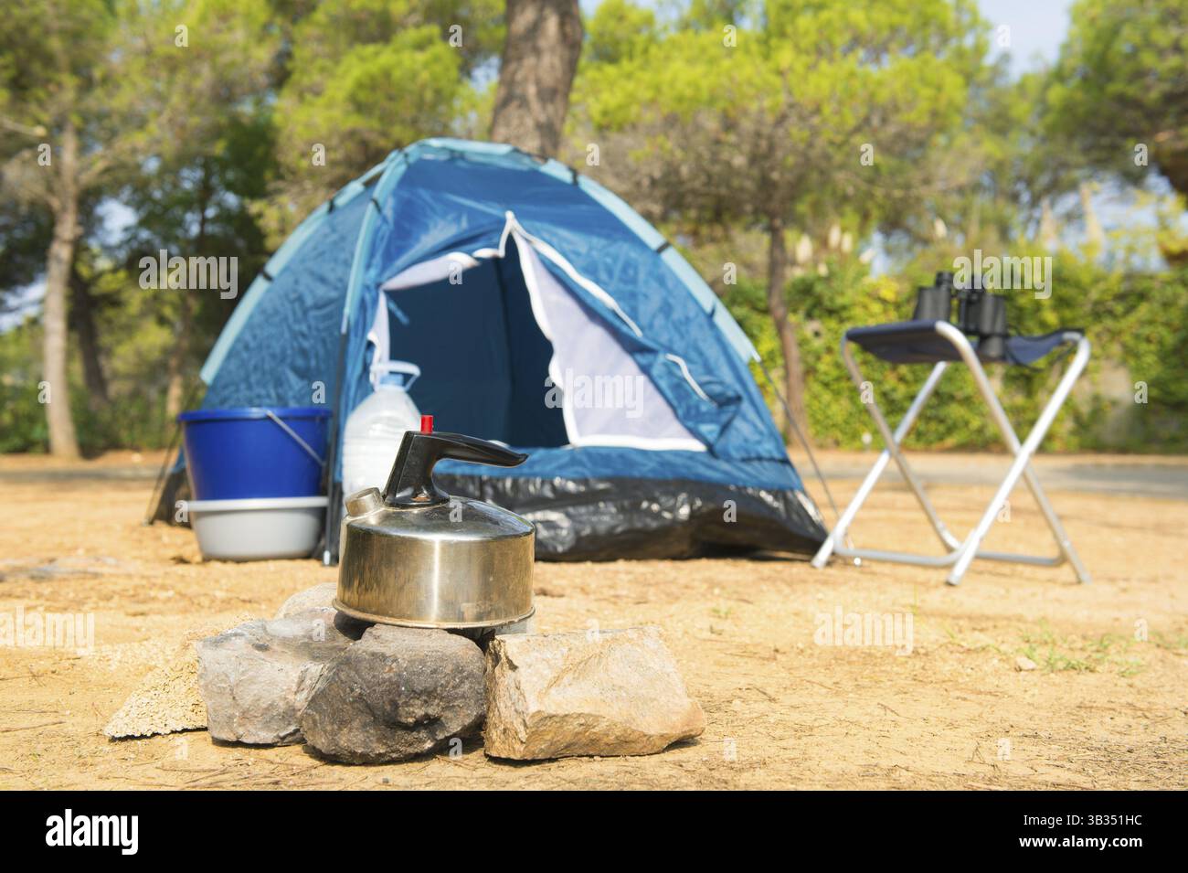 Blue dome tent for adventure camping Stock Photo - Alamy
