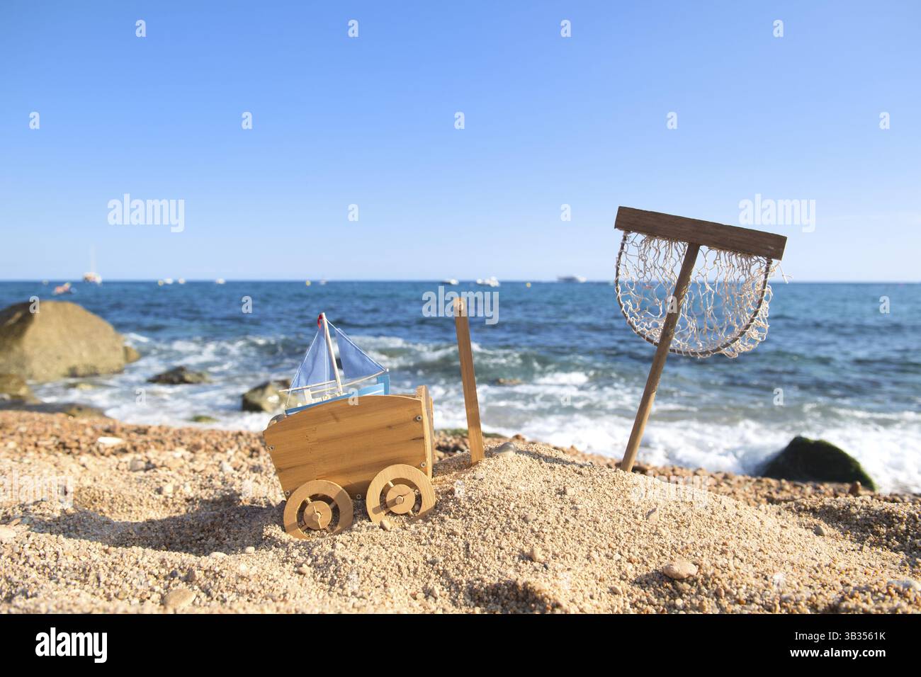 Fishing net in sand at the beach Stock Photo - Alamy