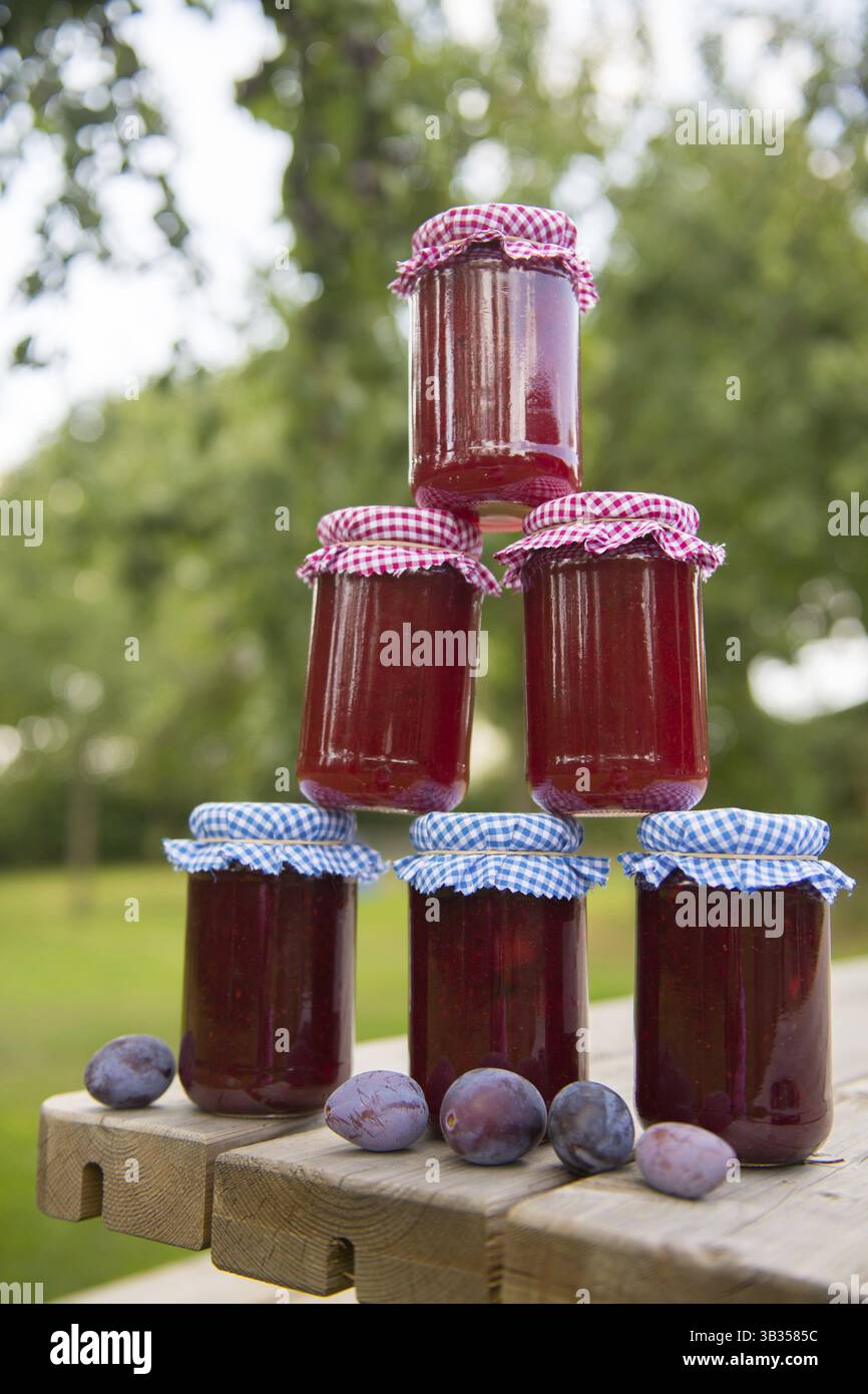 Homemade glass pots jam with fresh fruit in the orchard Stock Photo - Alamy