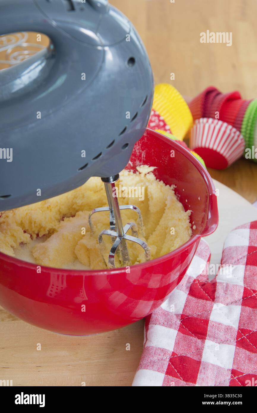 Baking cupcakes with metal form and paper models Stock Photo - Alamy